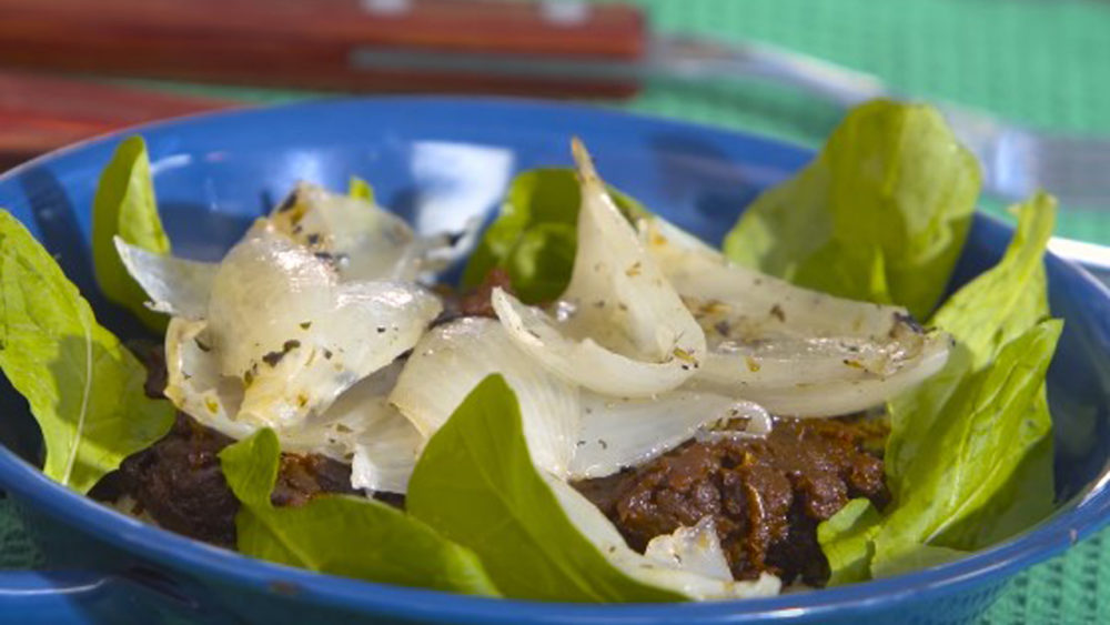 Provoleta con rúcula y pasta de tomates secos - Cucinare
